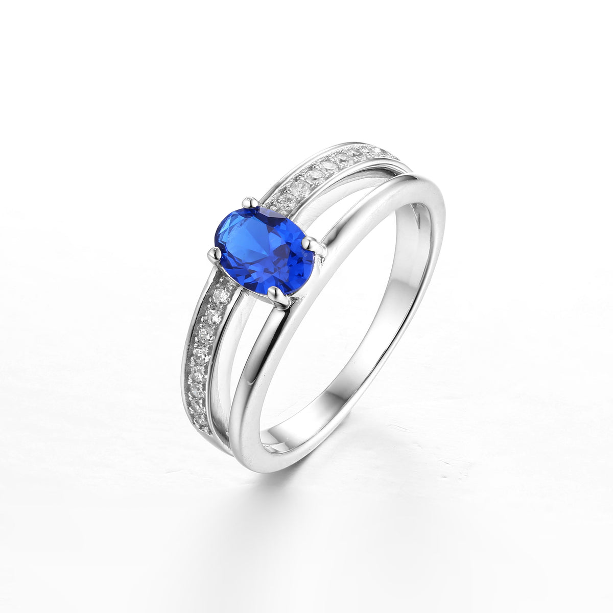 Sterling Silver Oval Blue CZ Ring with Pavé Accents and Double Band ...